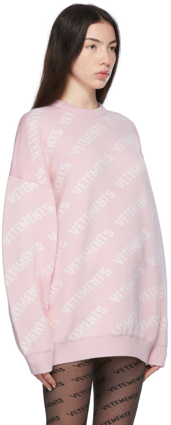 VETEMENTS Pink & White Allover Logo Sweater Vetements