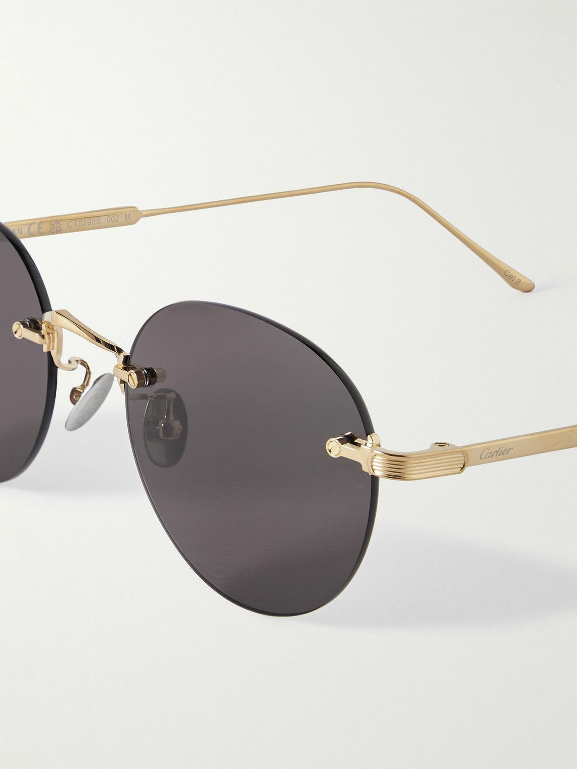 Cartier Eyewear Frameless Gold Tone Sunglasses Cartier