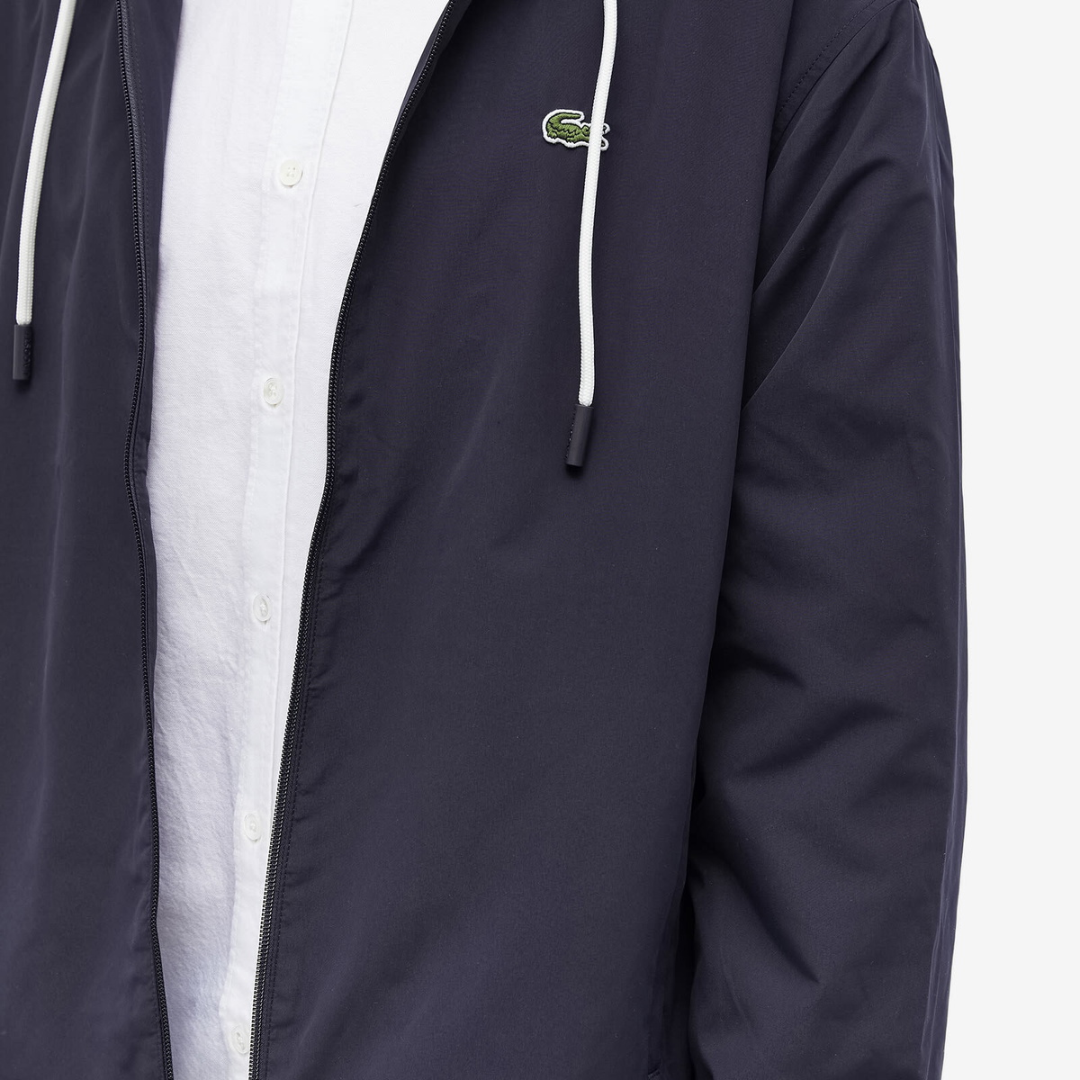 Lacoste Men's Lightweight Showerproof Jacket in Abysm Lacoste