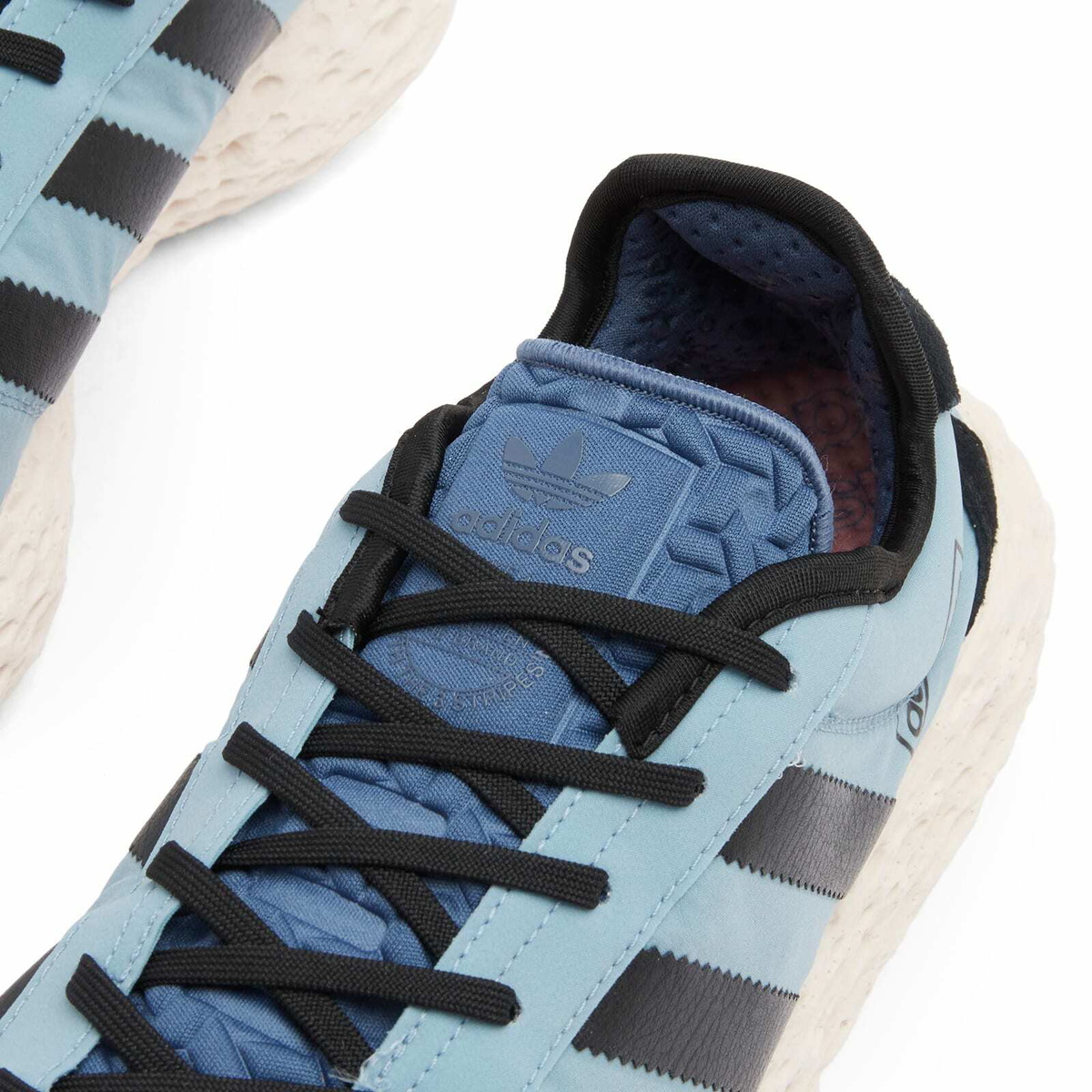 Adidas Men's Zponge Sneaker in Tactile Blue/Core Black/Wonder Mauve adidas