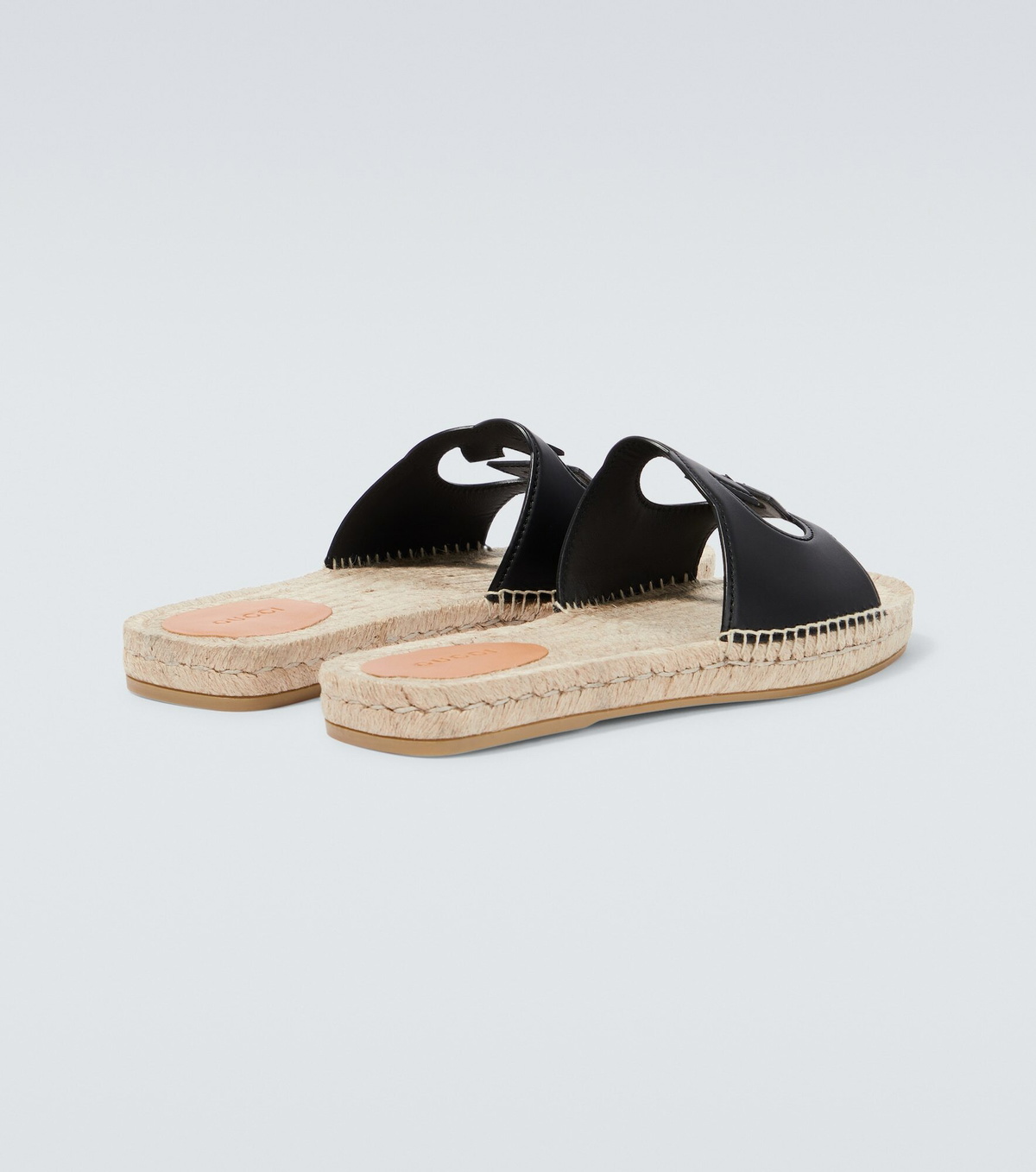 Gucci - Interlocking G leather and jute slides Gucci