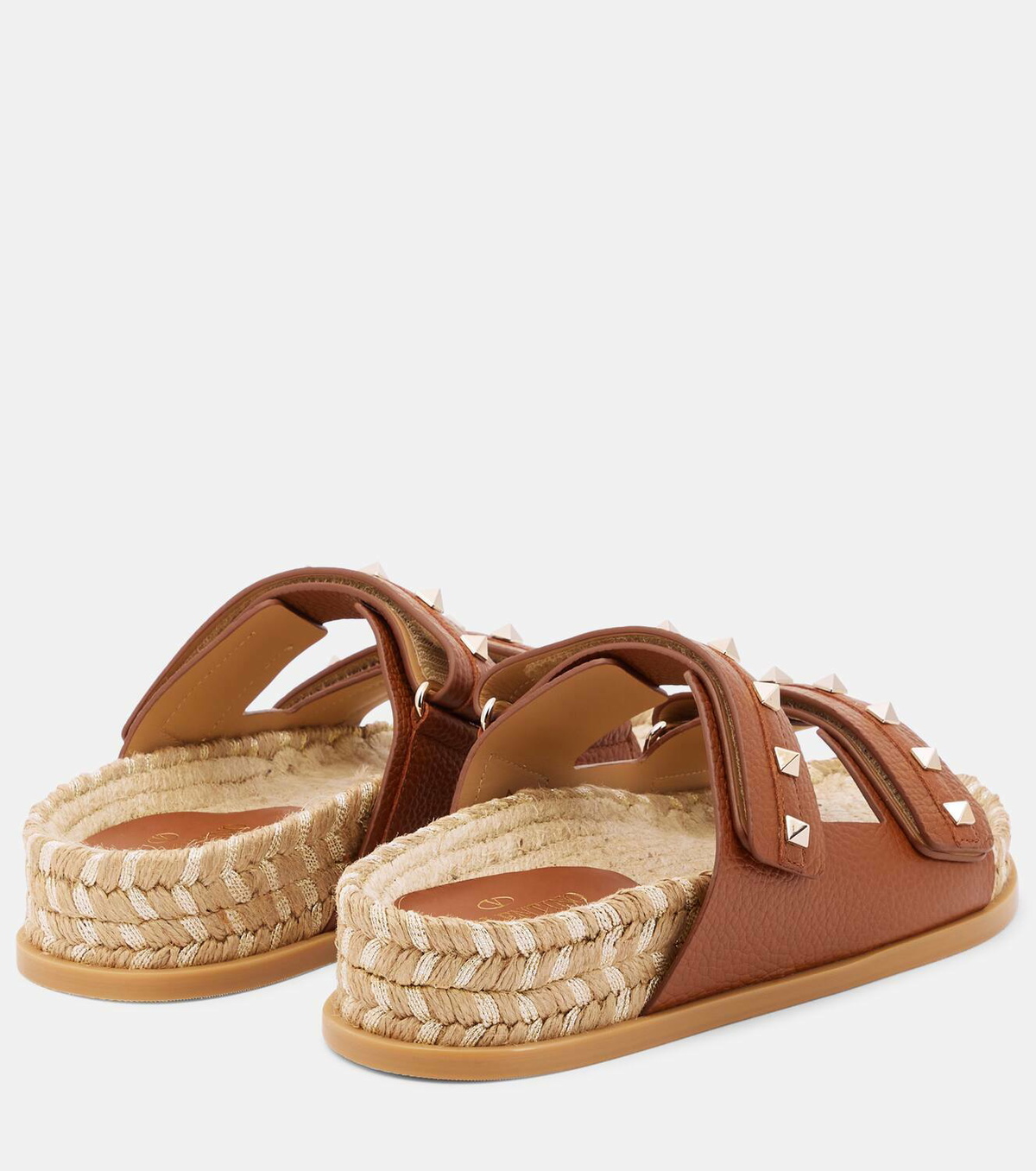 Valentino Garavani Rockstud leather and raffia slides Valentino Garavani