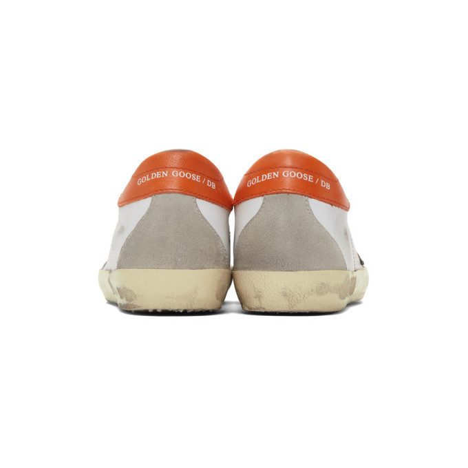 Golden Goose White and Orange Superstar Sneakers Golden Goose Deluxe Brand