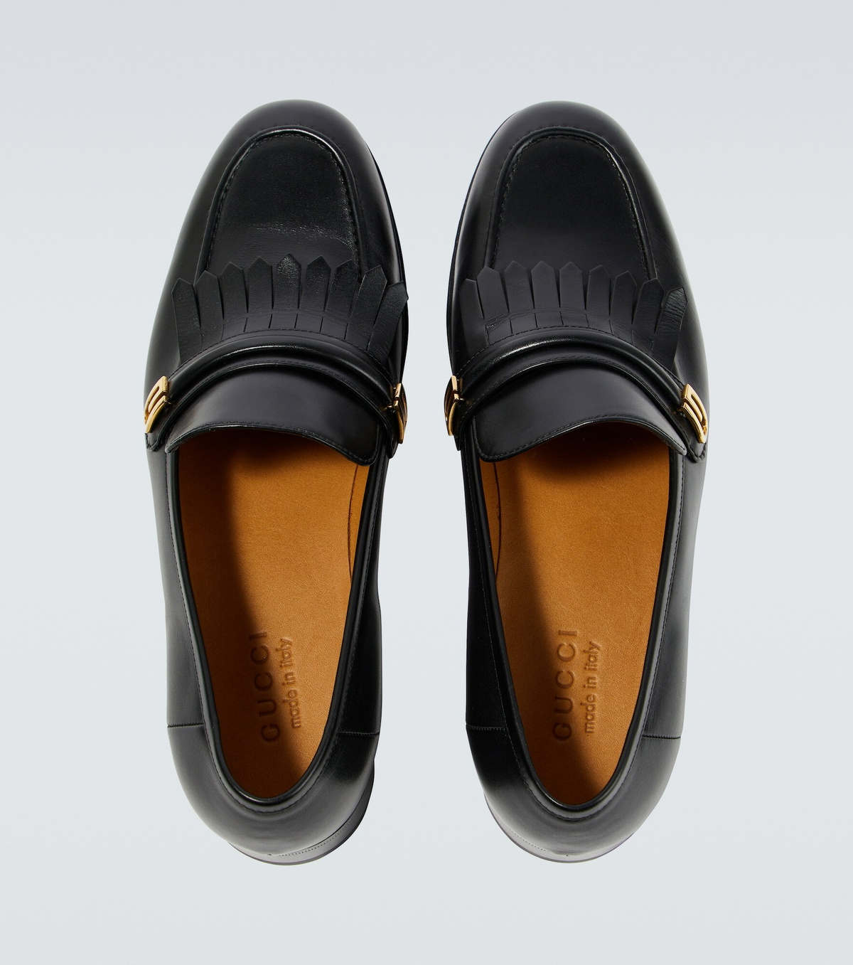 Gucci - Mirrored G fringed leather loafers Gucci