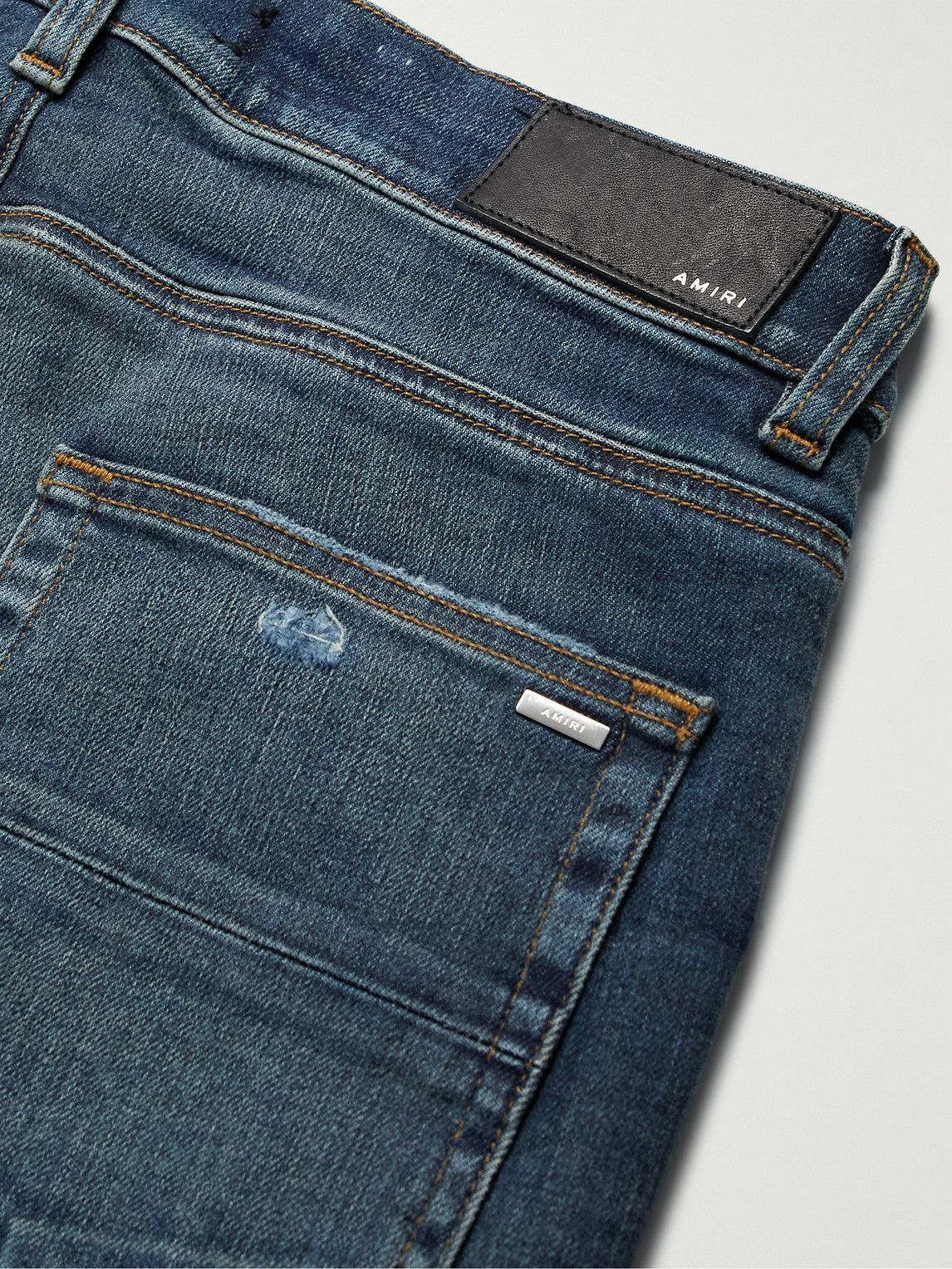 AMIRI - MX1 Skinny-Fit Panelled Distressed Jeans - Blue Amiri
