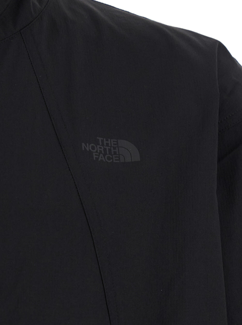 The North Face Black Jacket With High Neck And Embossed Logo On The ...
