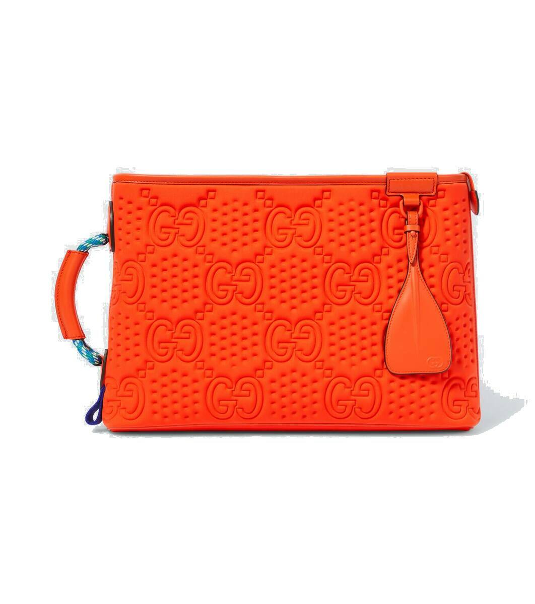 Gucci Large embossed GG leather-trimmed pouch Gucci