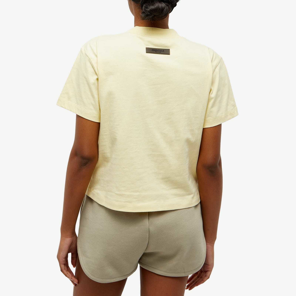 Fear of God ESSENTIALS Women's Short Sleeve T-Shirt in Canary Fear Of ...