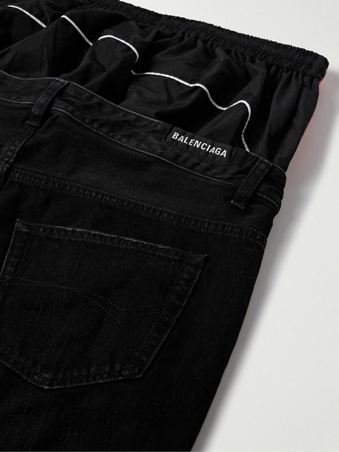 Balenciaga - Layered Shell-Trimmed Distressed Flared Jeans - Black ...