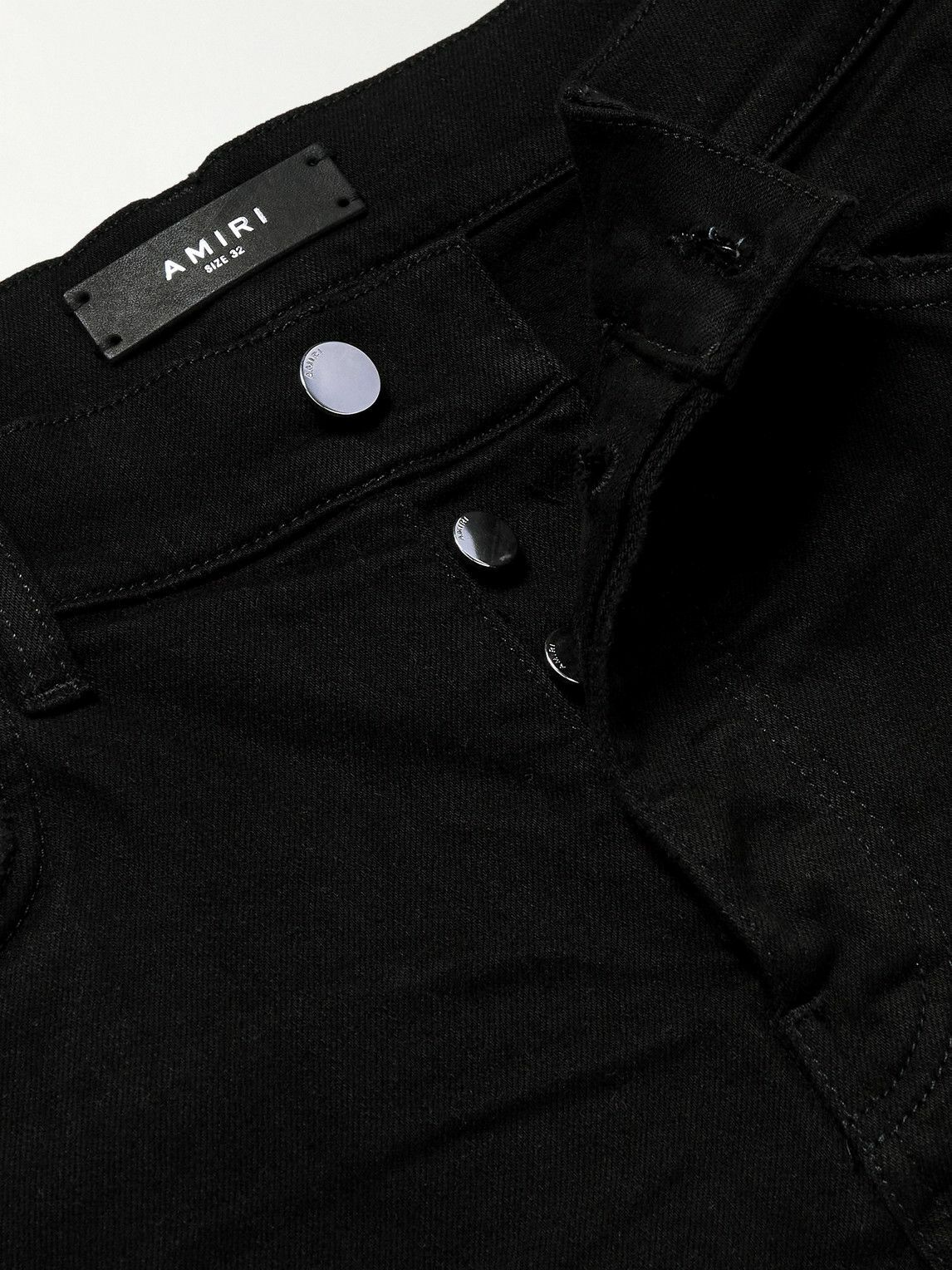 AMIRI - Skinny-Fit Logo-Appliquéd Panelled Distressed Jeans - Black Amiri