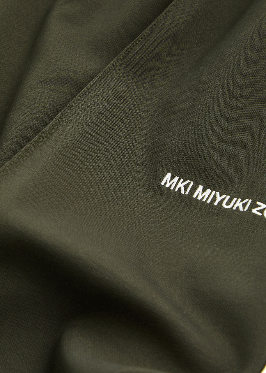 Mki Miyuki Zoku Logo Wide-leg Jersey Track Pants Olive MKI Miyuki-Zoku