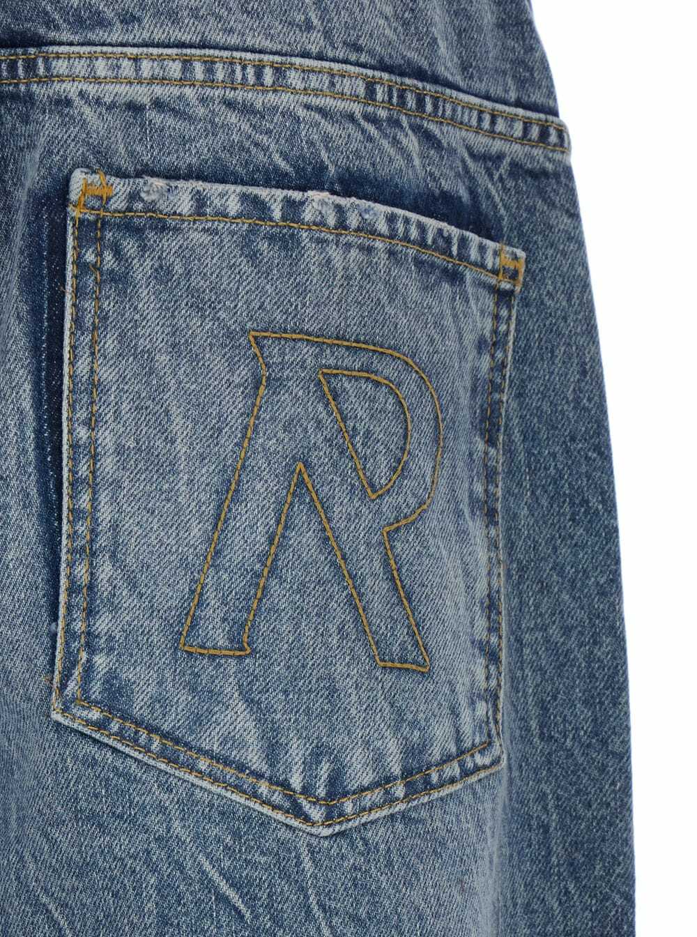 REPRESENT r3 Blue Jeans With Ripped Details On The Front And Logo ...