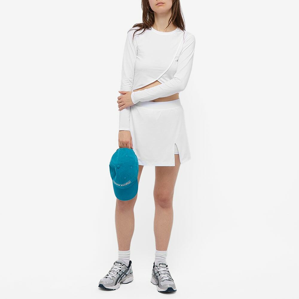 Casall Women's Long Sleeve Overlap Crop Top in White CASALL