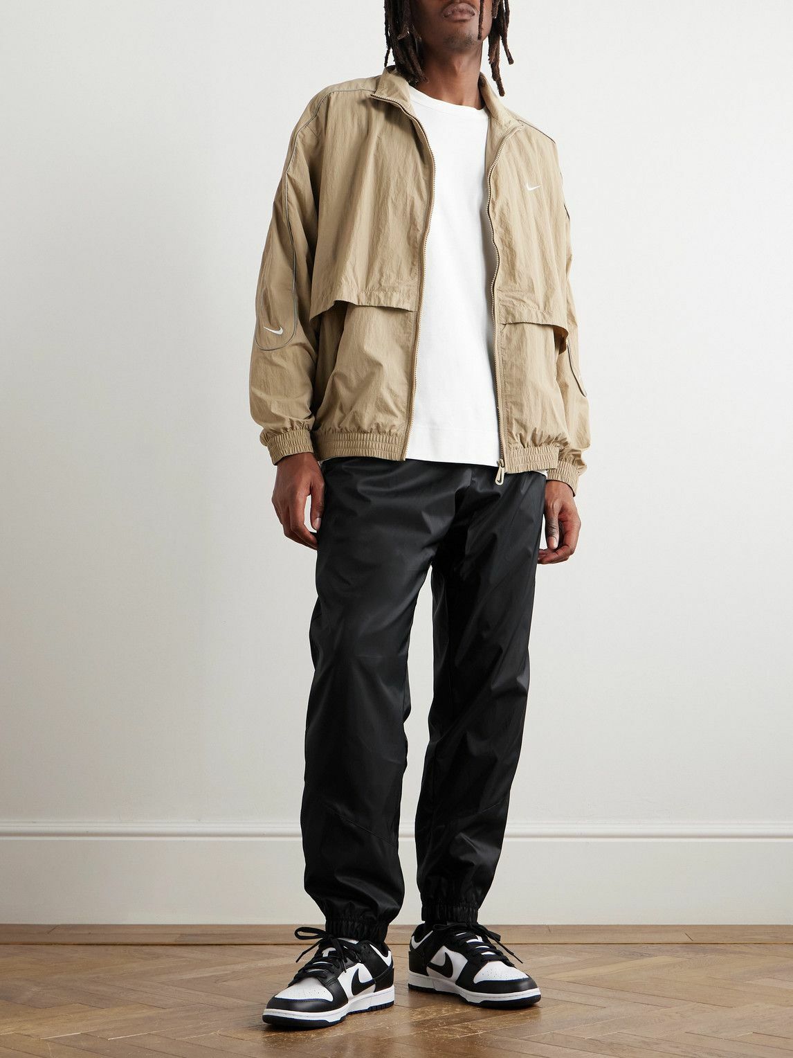 Nike - Windrunner Tapered Logo-Embroidered Shell Sweatpants - Black Nike