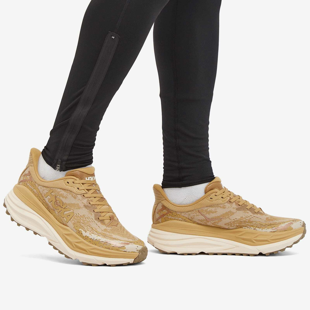 Hoka One One Men's Stinson 7 Sneakers in Wheat/Shifting Sand Hoka One One