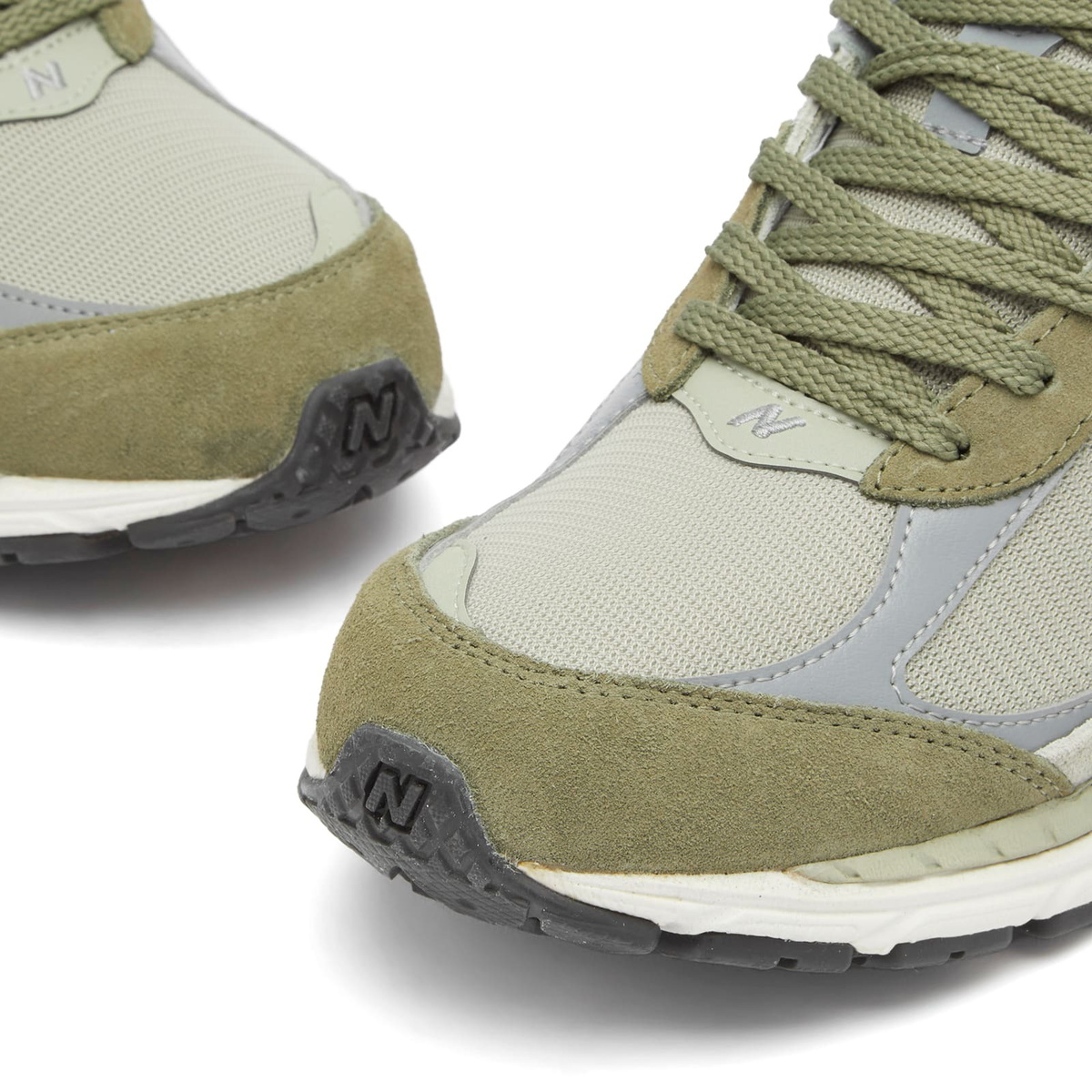 New Balance U2002RCA Sneaker in Dark Olivine New Balance