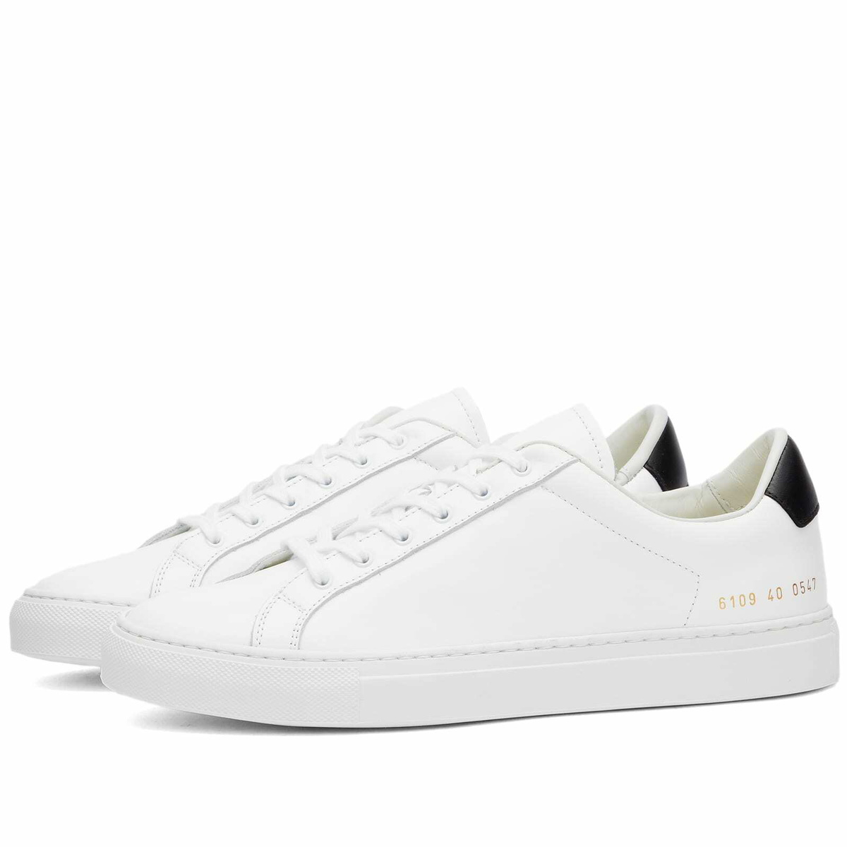 Woman by Common Projects Women's Retro Low Sneakers in White/Black ...