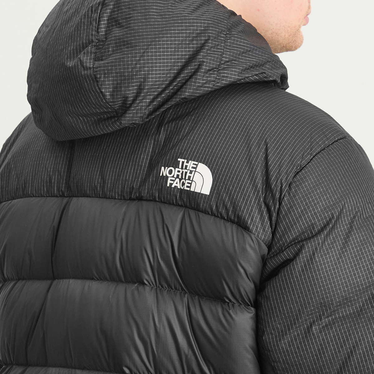 The North Face Men's HKE Kalix Down Hooded Jacket in Tnf Black The ...