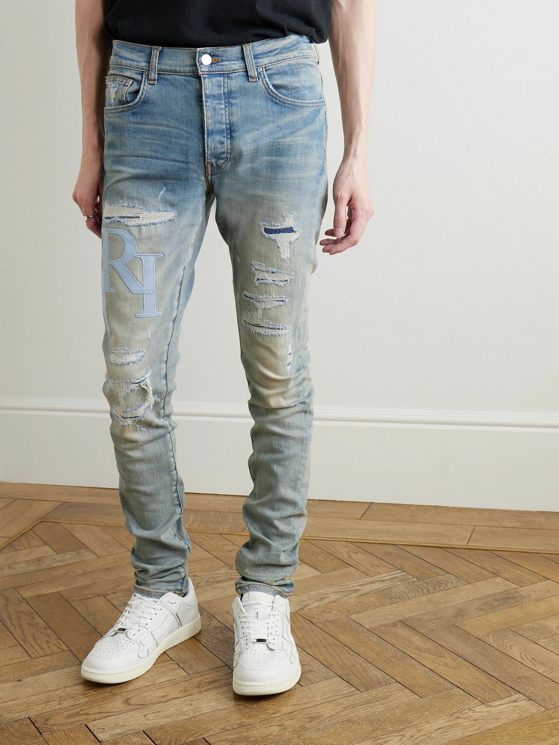 AMIRI - Slim-Fit Straight-Leg Logo-Appliquéd Panelled Distressed Jeans ...
