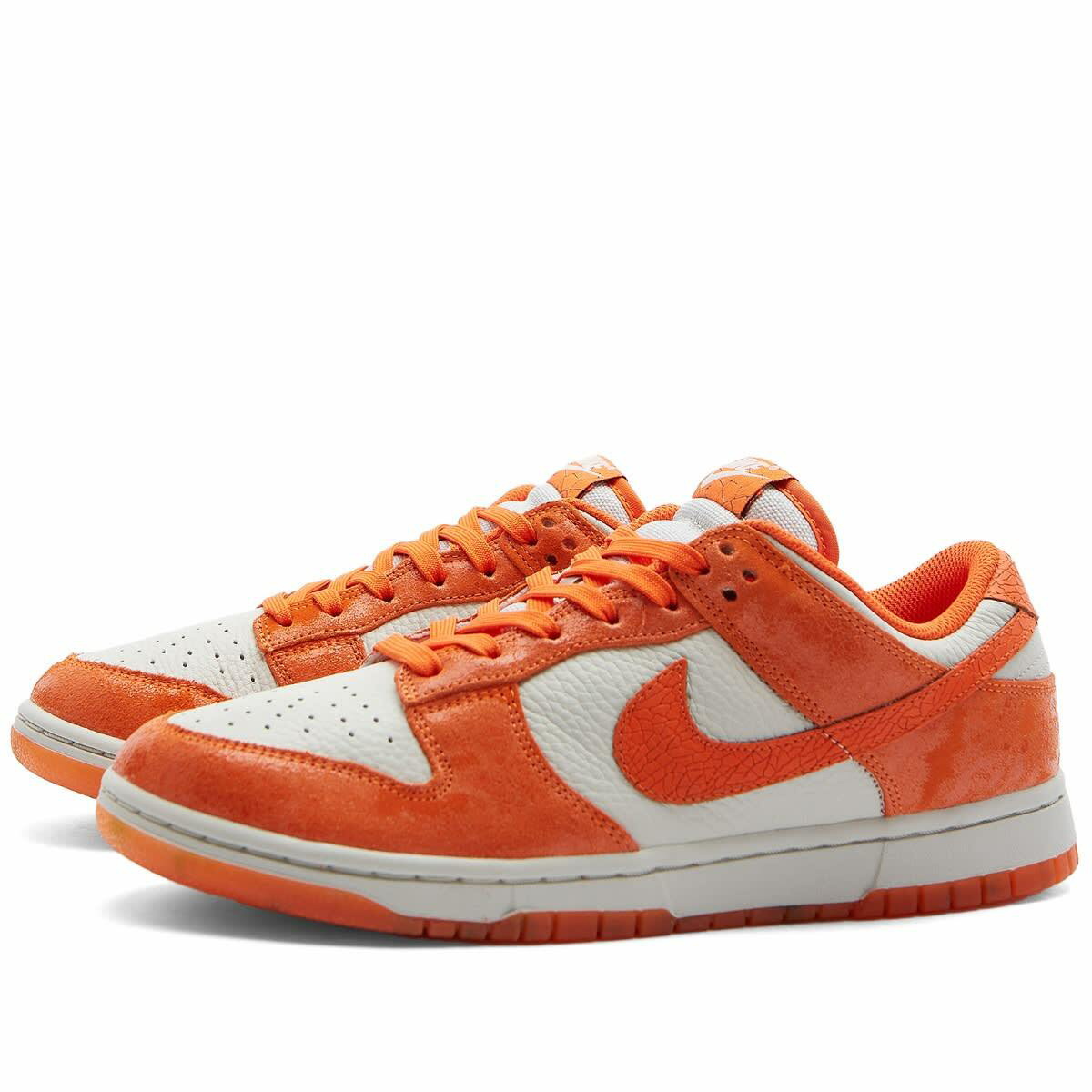 Nike Women's Dunk Low W Sneakers in Light Bone/Safety Orange Nike