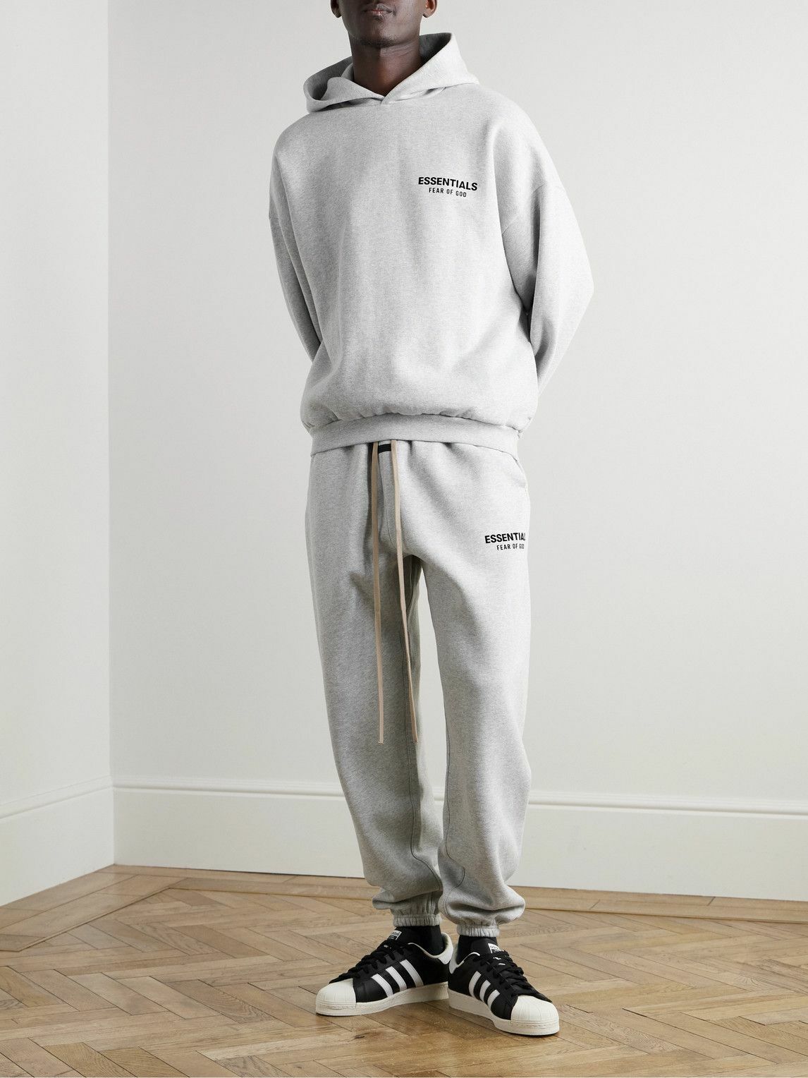 FEAR OF GOD ESSENTIALS - Tapered Logo-Appliquéd Cotton-Blend Jersey ...