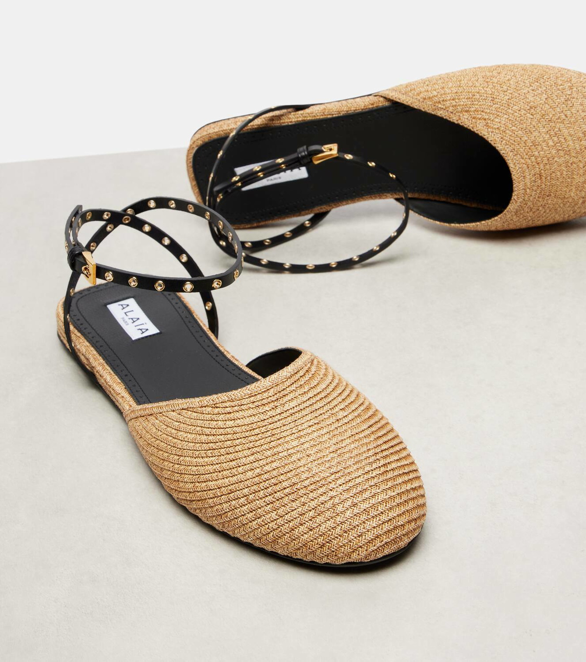 Alaïa Leather-trimmed raffia flats ALAÏA