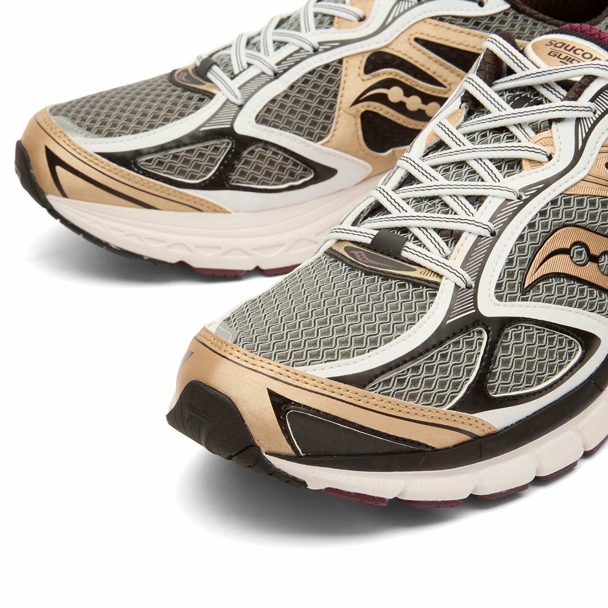 Saucony Men's Progrid Guide 7 Sneaker in White/Bronze Saucony