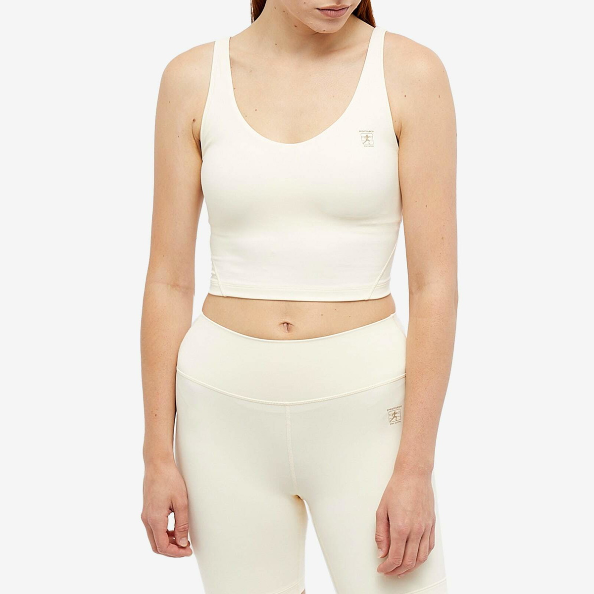Sporty & Rich Women's Runner Sports Bra in Cream/Black Sporty & Rich