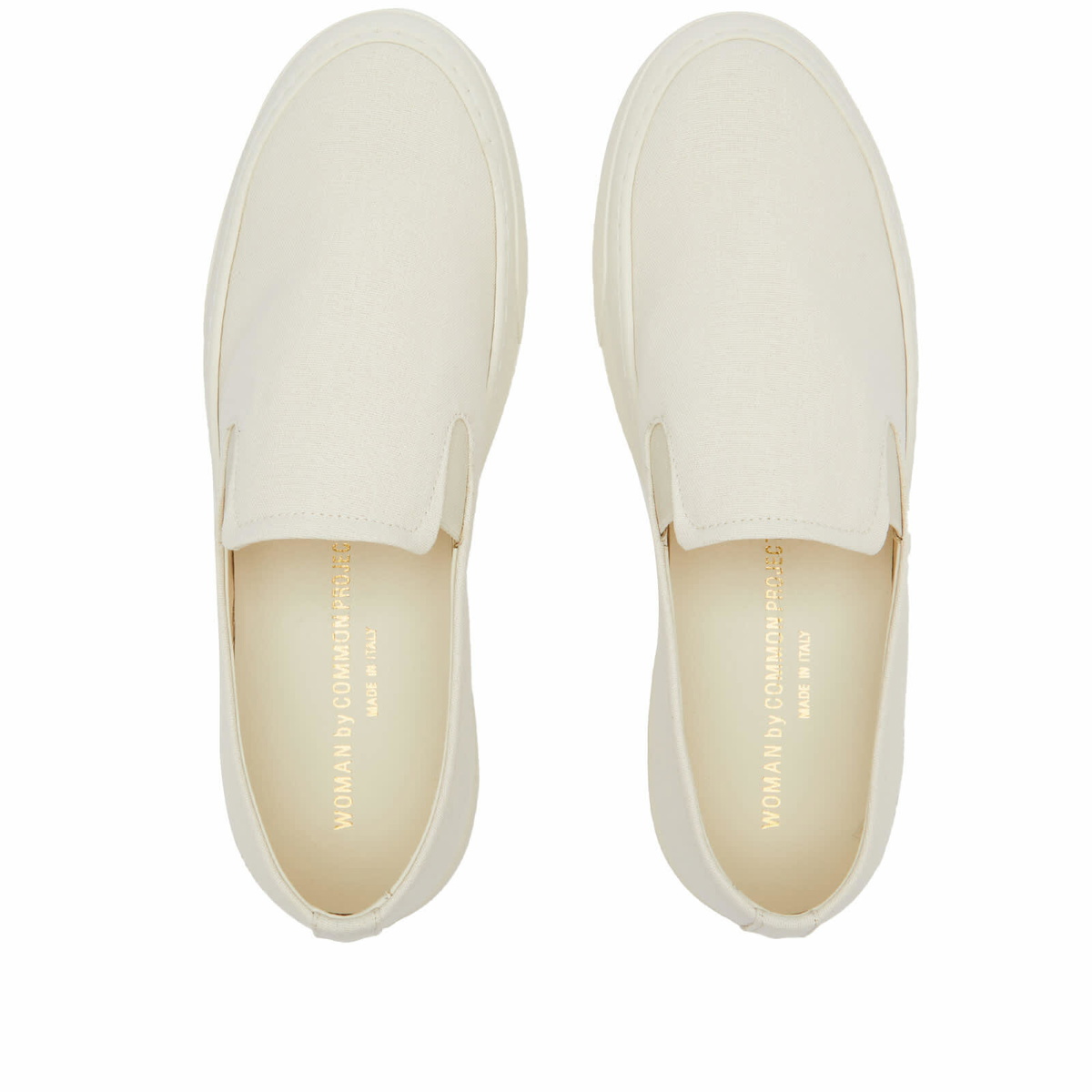 Woman by Common Projects Women's Slip on Canvas Sneakers in Off White ...