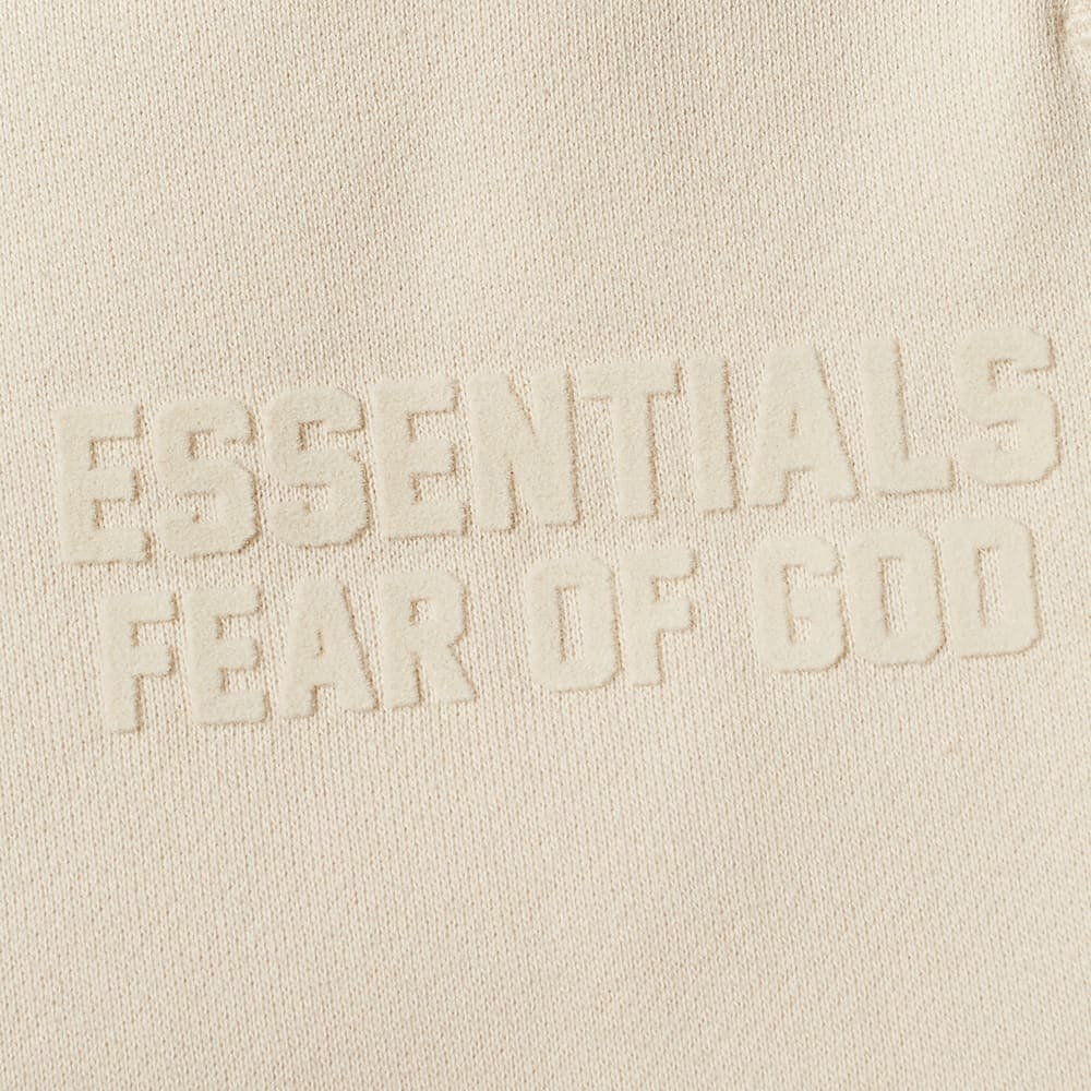 Fear of God ESSENTIALS Kids Logo Sweat Pant in Egg Shell Fear Of God ...