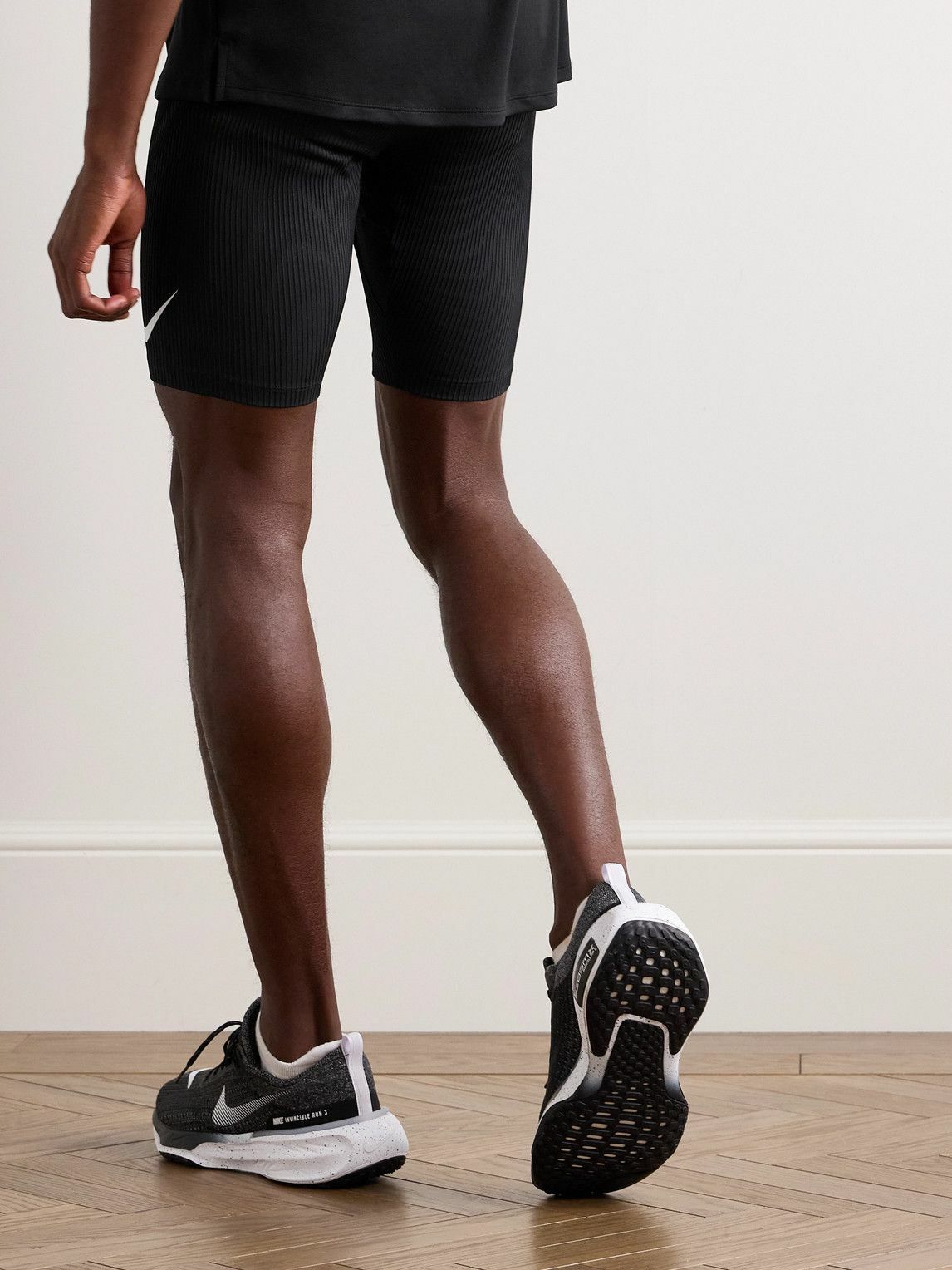 Nike Running - AeroSwift Logo-Print Ribbed Dri-FIT ADV Shorts - Black ...