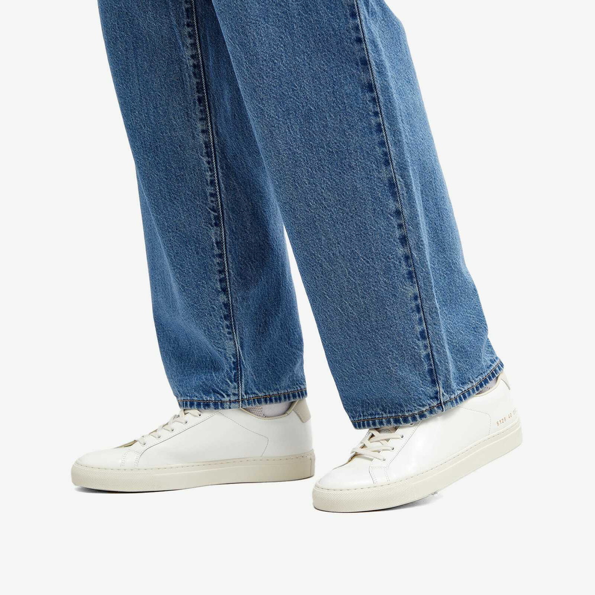 Woman by Common Projects Women's Retro Gloss Trainers Sneakers in White ...