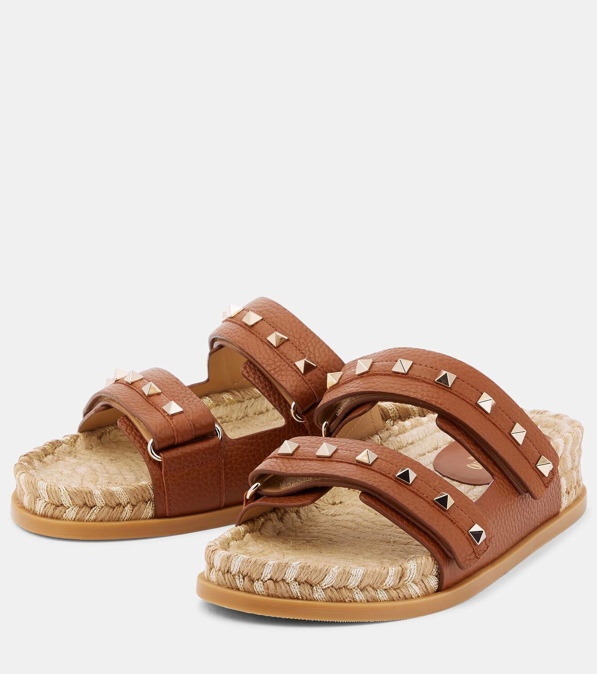 Valentino Garavani Rockstud leather and raffia slides Valentino Garavani