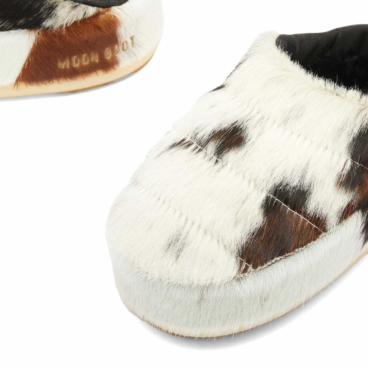 Moon Boot Women's Pony Skin Mules in Cow Print Moon Boot
