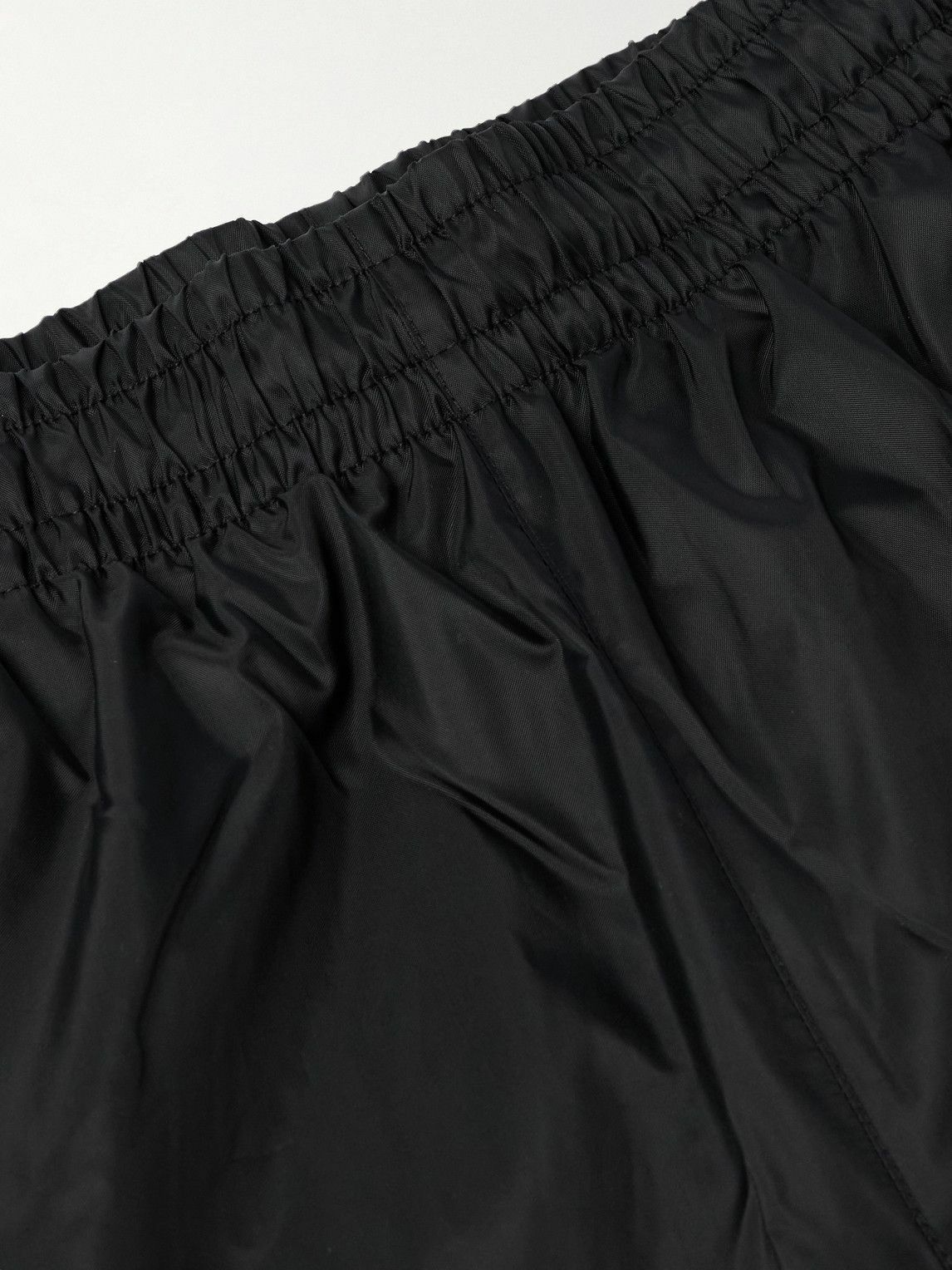 Nike - Windrunner Tapered Logo-Embroidered Shell Sweatpants - Black Nike