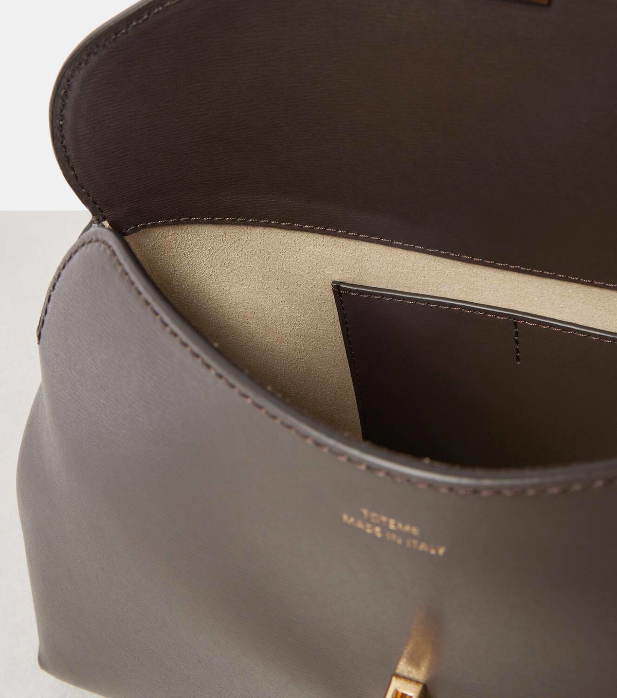 Toteme T-Lock Small leather clutch Toteme