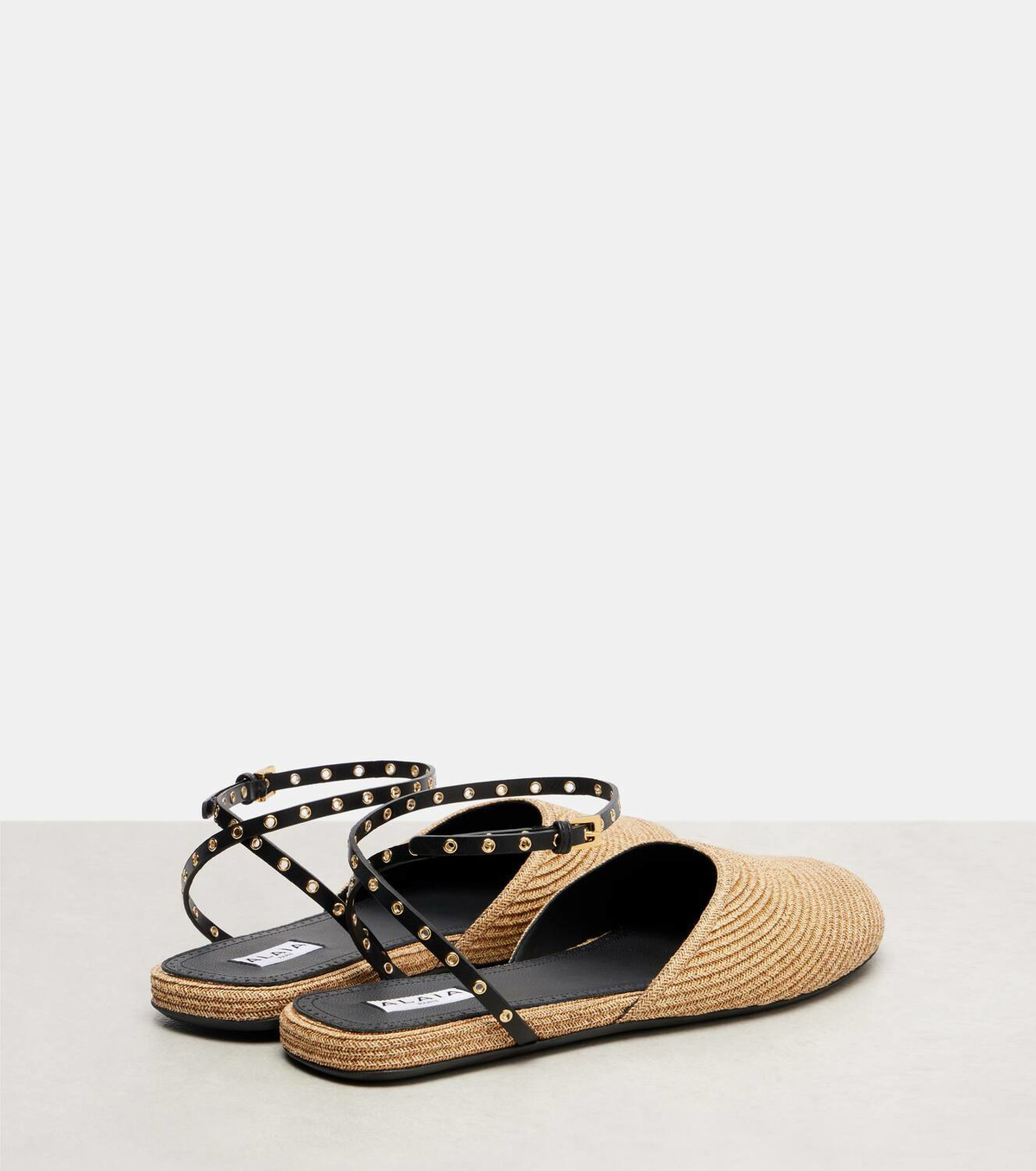 Alaïa Leather-trimmed raffia flats ALAÏA