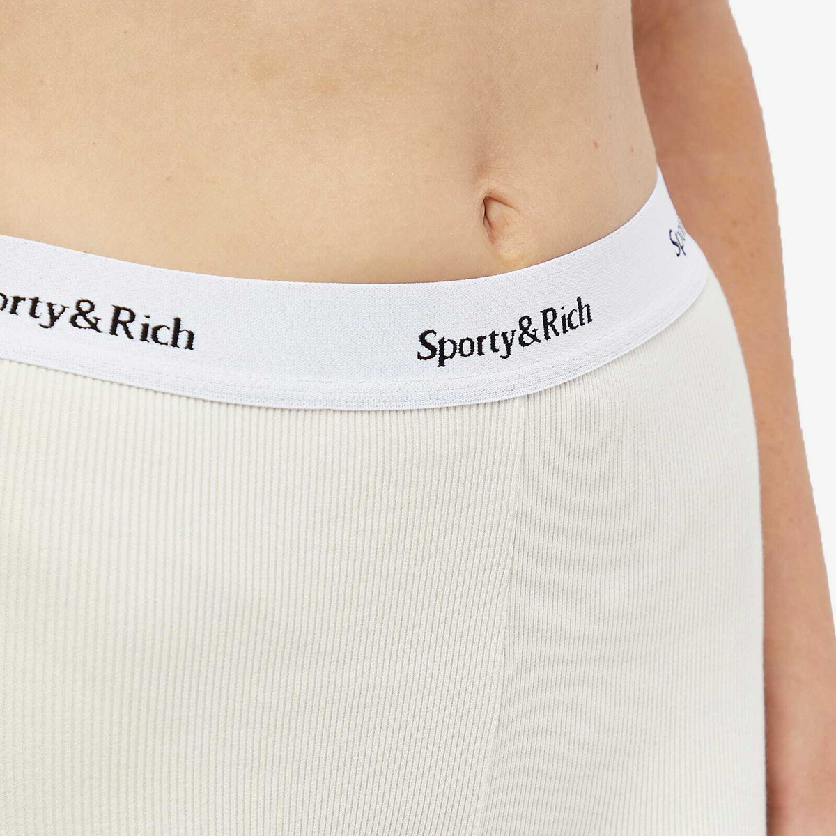 Sporty & Rich Women's Serif Logo Ribbed Cycling Short in Cream Sporty ...