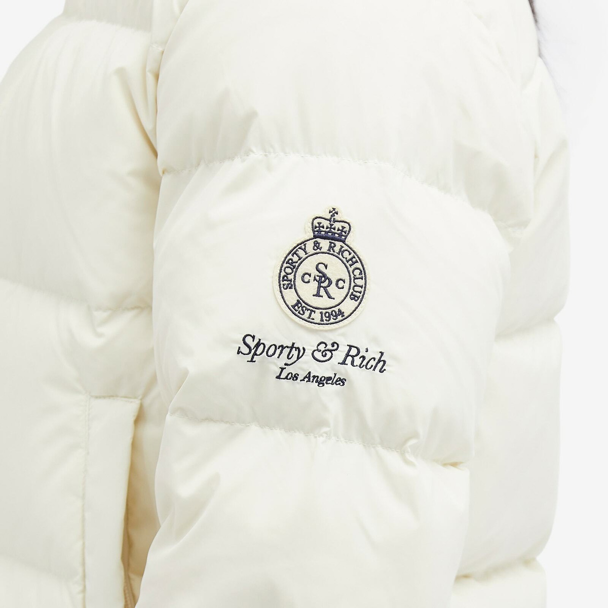 Sporty & Rich Women's Crown LA Puffer Jacket in Cream Sporty & Rich