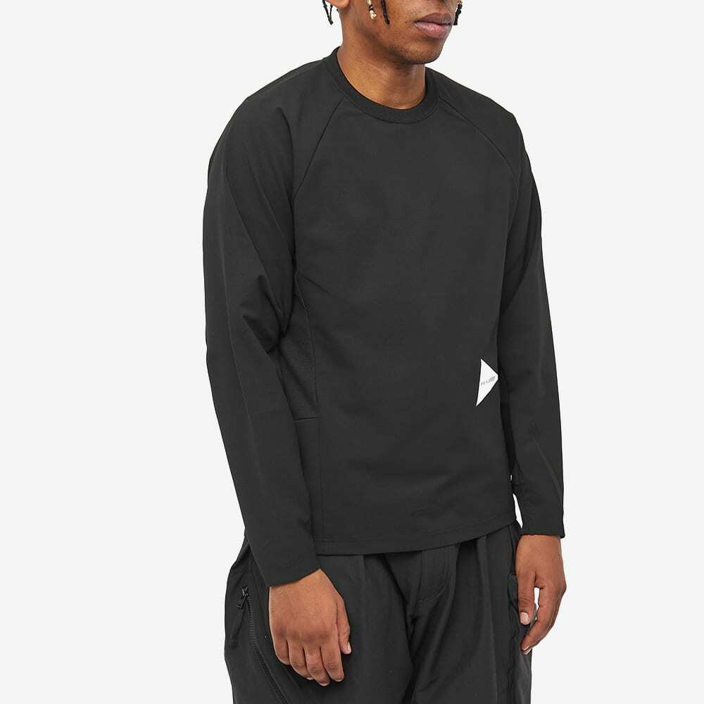 And Wander Men's Hybrid Base Layer in Black and Wander