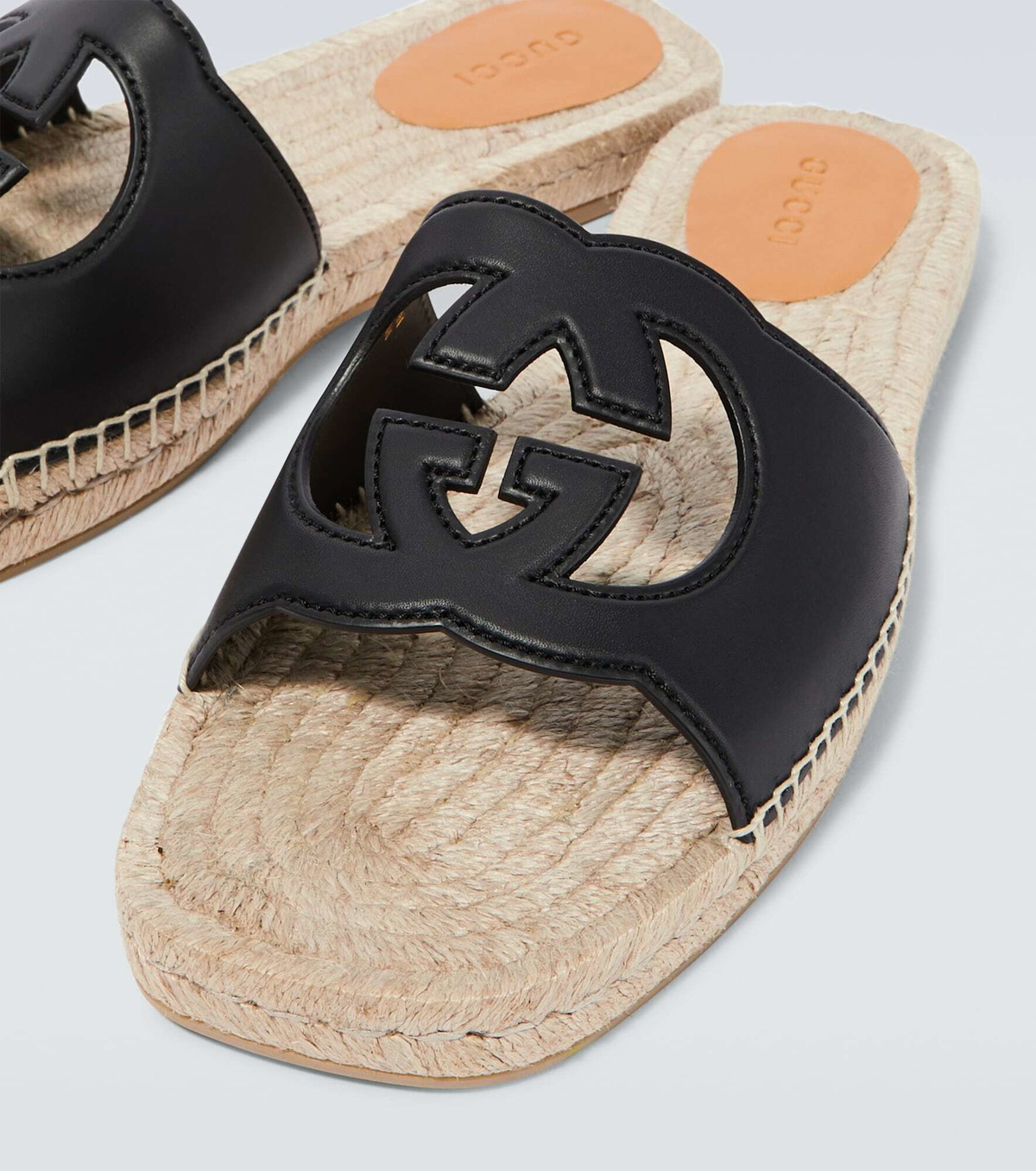 Gucci - Interlocking G leather and jute slides Gucci