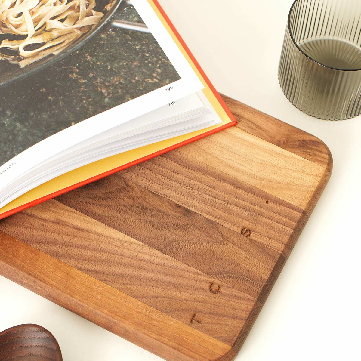 The Conran Shop Handle Chopping Board in Walnut The Conran Shop