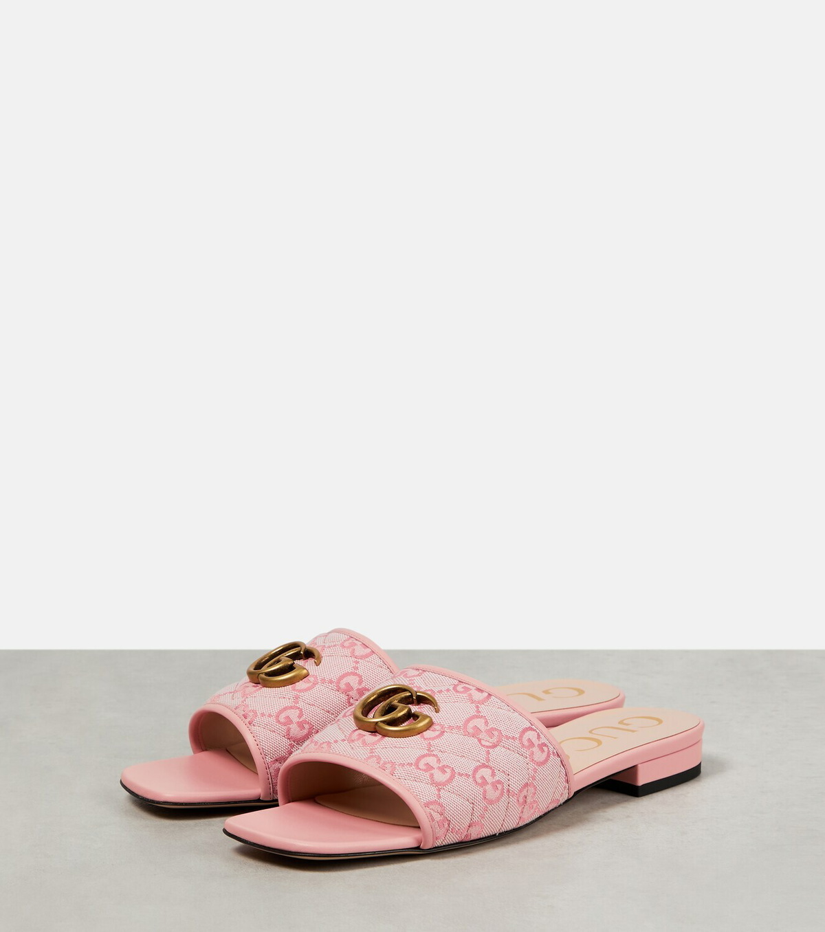 Gucci - Double G leather-trimmed canvas slides Gucci