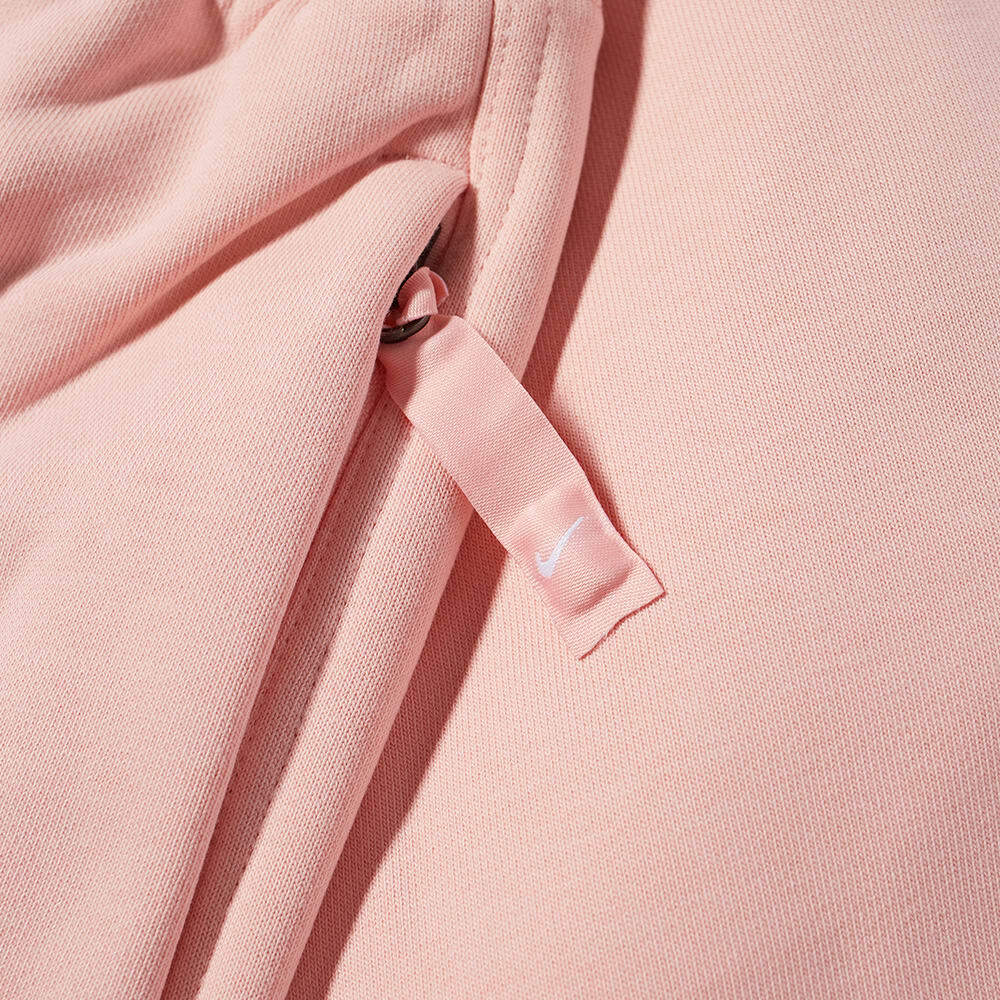 Nike NRG Solo Swoosh Fleece Short in Bleached Coral/White Nike