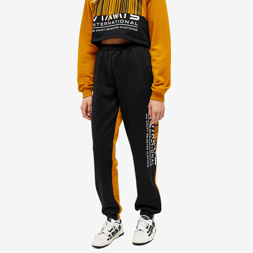 VTMNTS Women's International Logo Pants in Mustard/Black VTMNTS