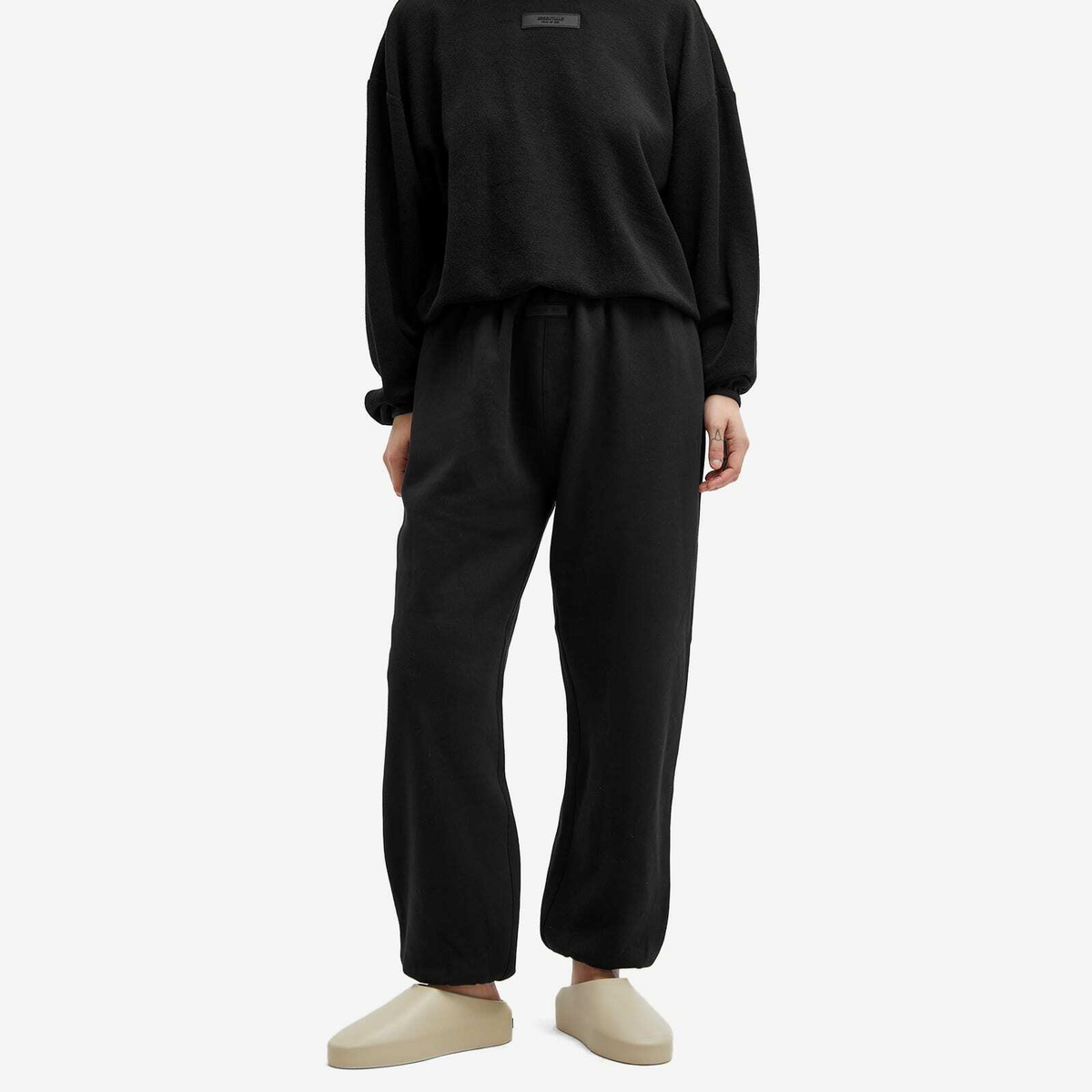 Fear of God ESSENTIALS Women's Sweat Pants in Jet Black Fear Of God ...