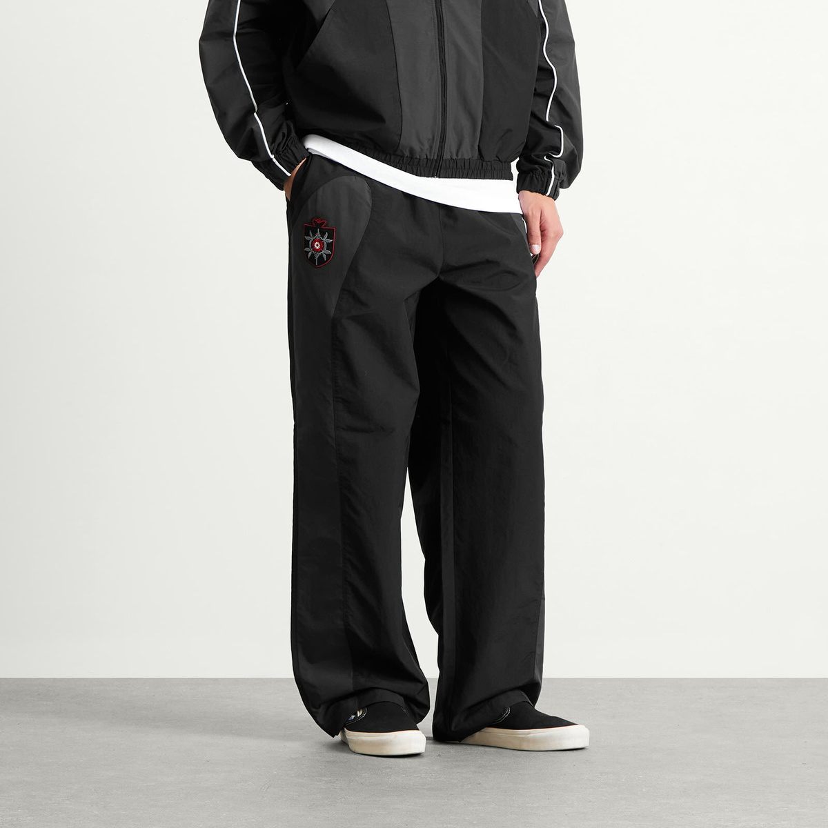 Umbro by Slam Jam Men's Rose Crest Track Pants in Black Dark Gray Umbro