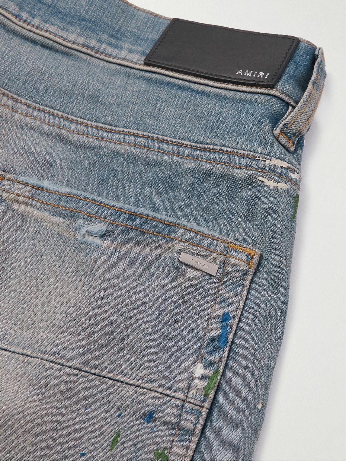 AMIRI - MX1 Skinny-Fit Paint-Splattered Panelled Distressed Jeans ...