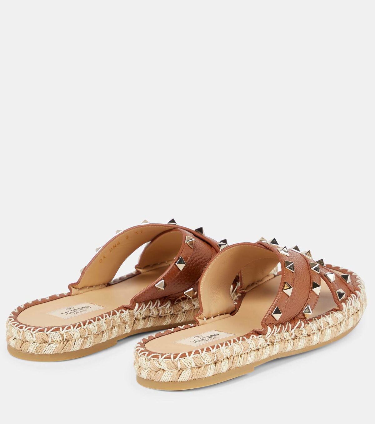 Valentino Garavani Rockstud leather and raffia slides Valentino Garavani