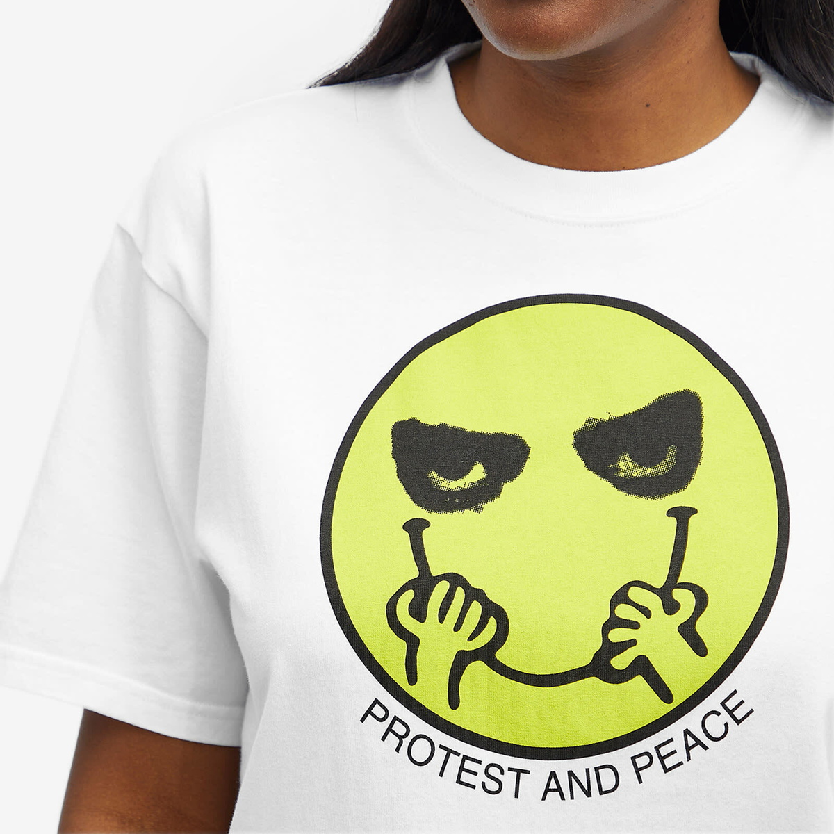 Undercover Women's Simley Propaganda T-Shirt in White Undercover